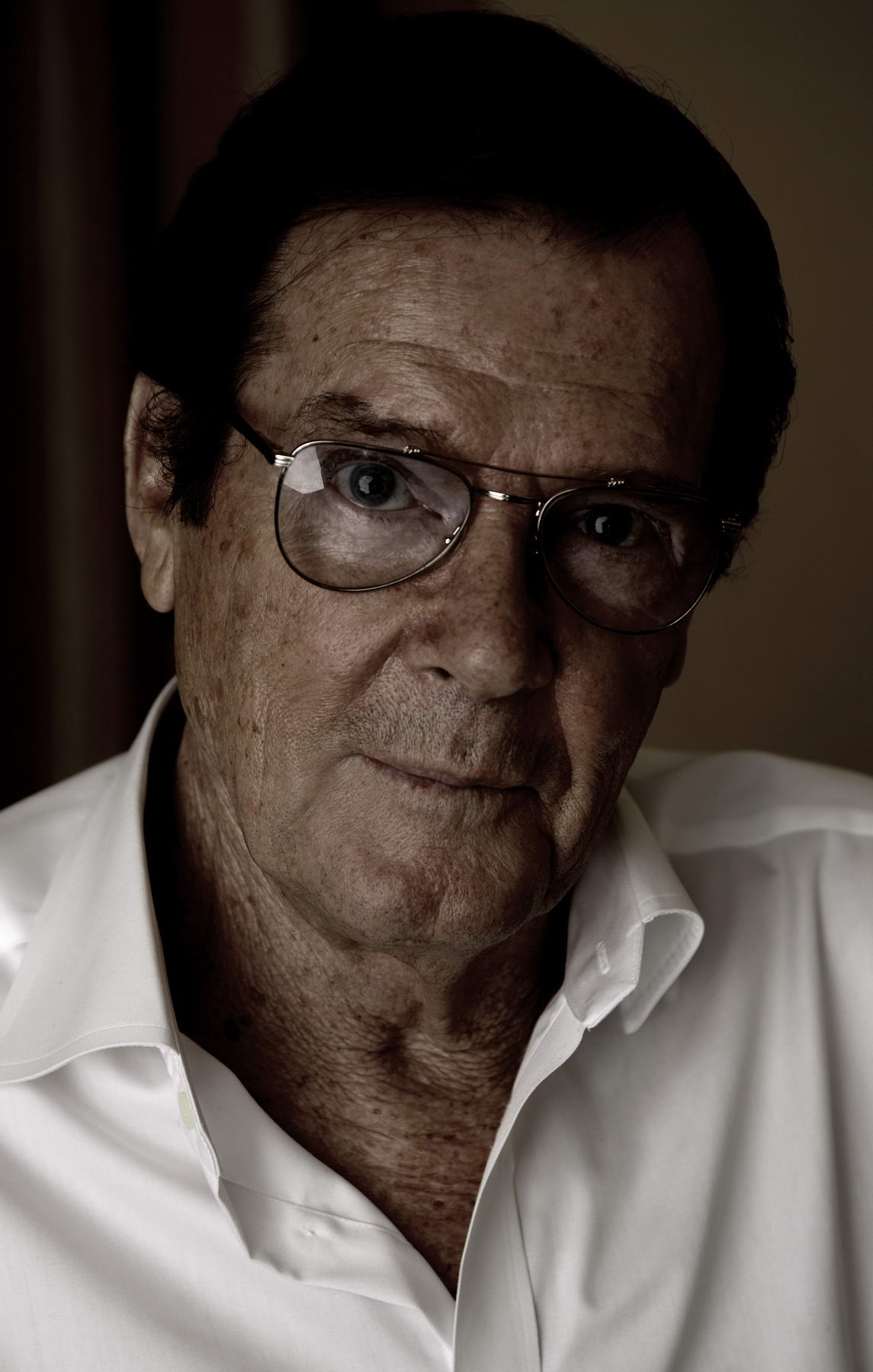 Sir Roger Moore – Manfred Baumann